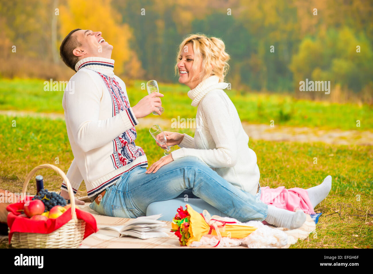 happy couple relaxing weekend on a picnic Stock Photo - Alamy