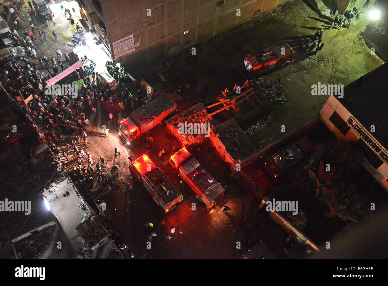 Cairo, Egypt. 3rd Feb, 2015. Egyptian firefighters try to extinguish a ...