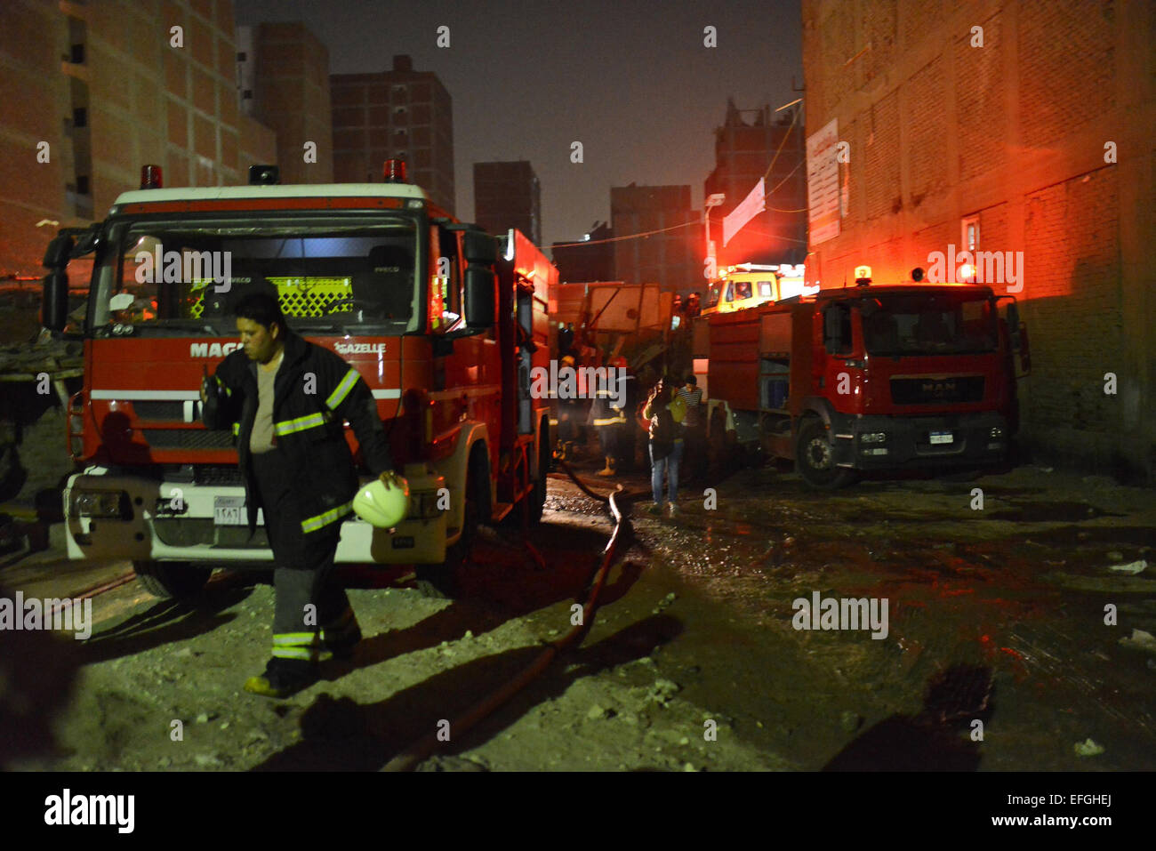 Cairo, Egypt. 3rd Feb, 2015. Egyptian firefighters try to extinguish a ...
