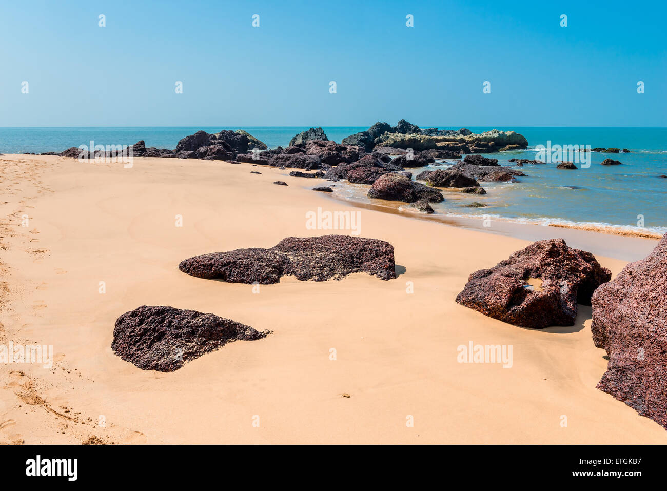 beautiful landscape of beach with sand and stones Stock Photo - Alamy