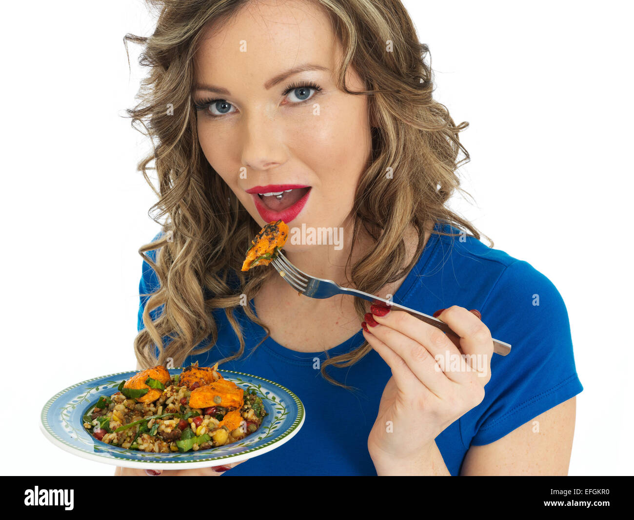 Healthy Young Woman Eating Chicken Tikka and Rice Salad Stock Photo - Alamy