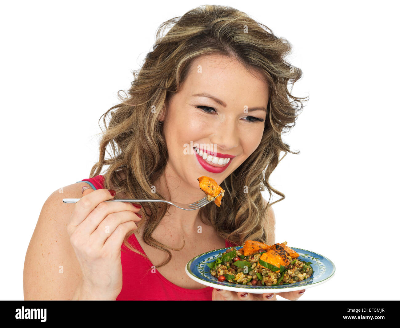 Heathly Young Woman Eating a Chicken Tikka and Rice Salad Stock Photo ...