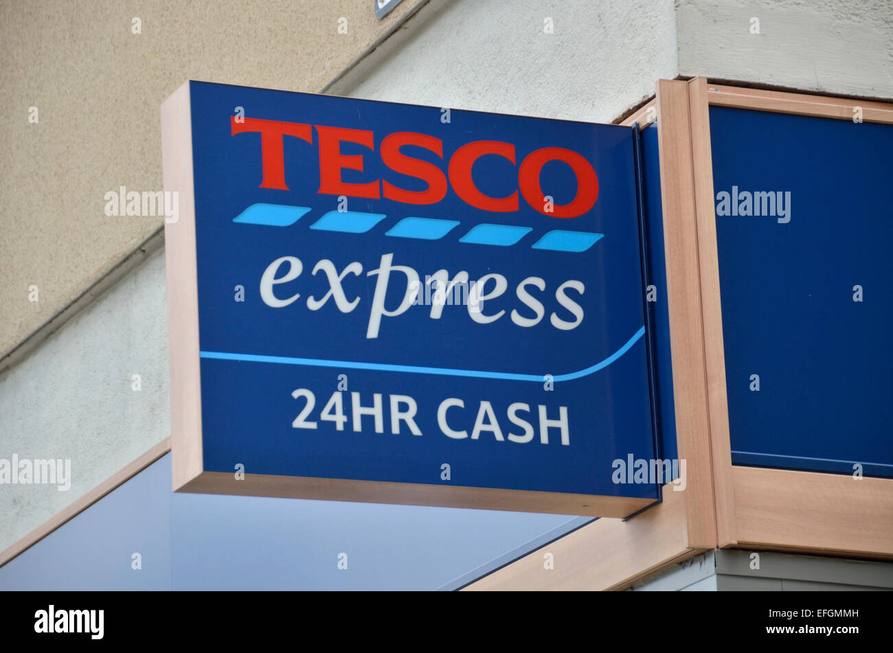 Tesco Express 24 Hour Cash sign, London, UK Stock Photo - Alamy