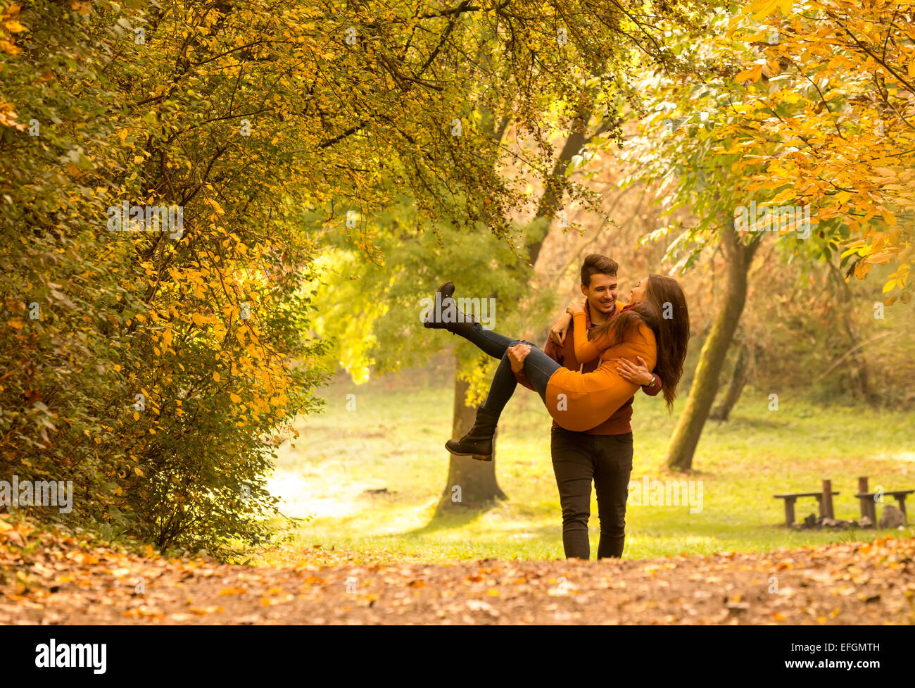 In love with a man, pick up a woman on his lap Stock Photo - Alamy