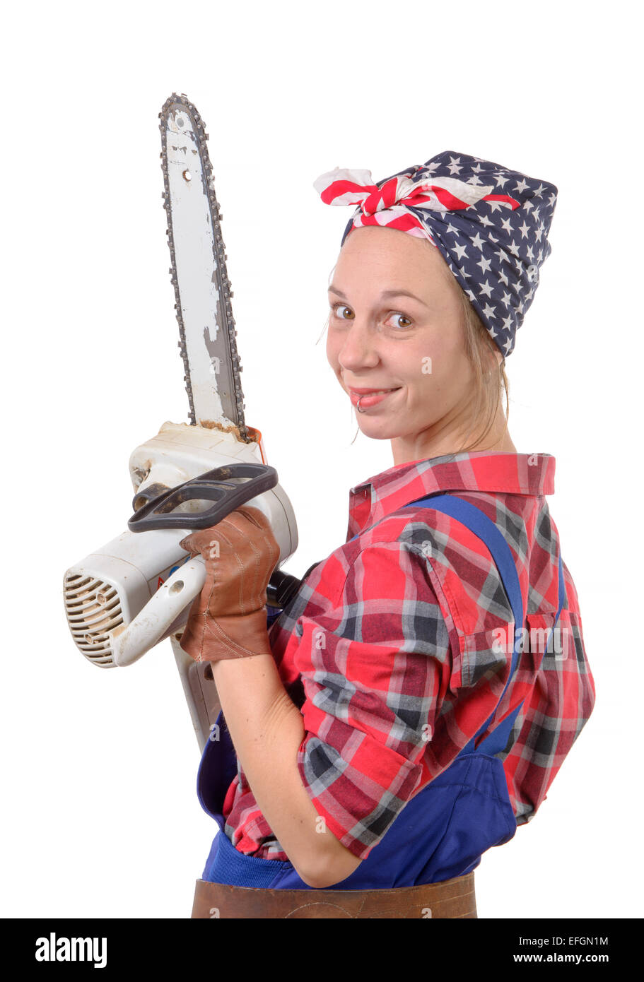 Vintage pretty young woman with a chainsaw on the white background ...
