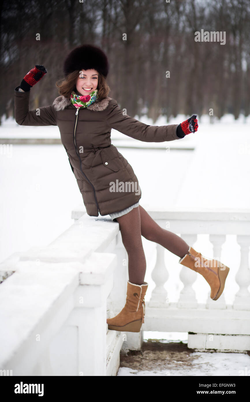 Laughing female standing in a funny pose Stock Photo - Alamy