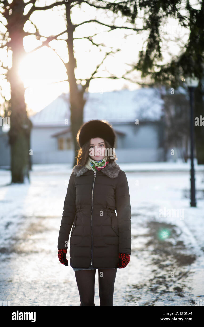 Young woman stands in the cold park in wintertime Stock Photo - Alamy