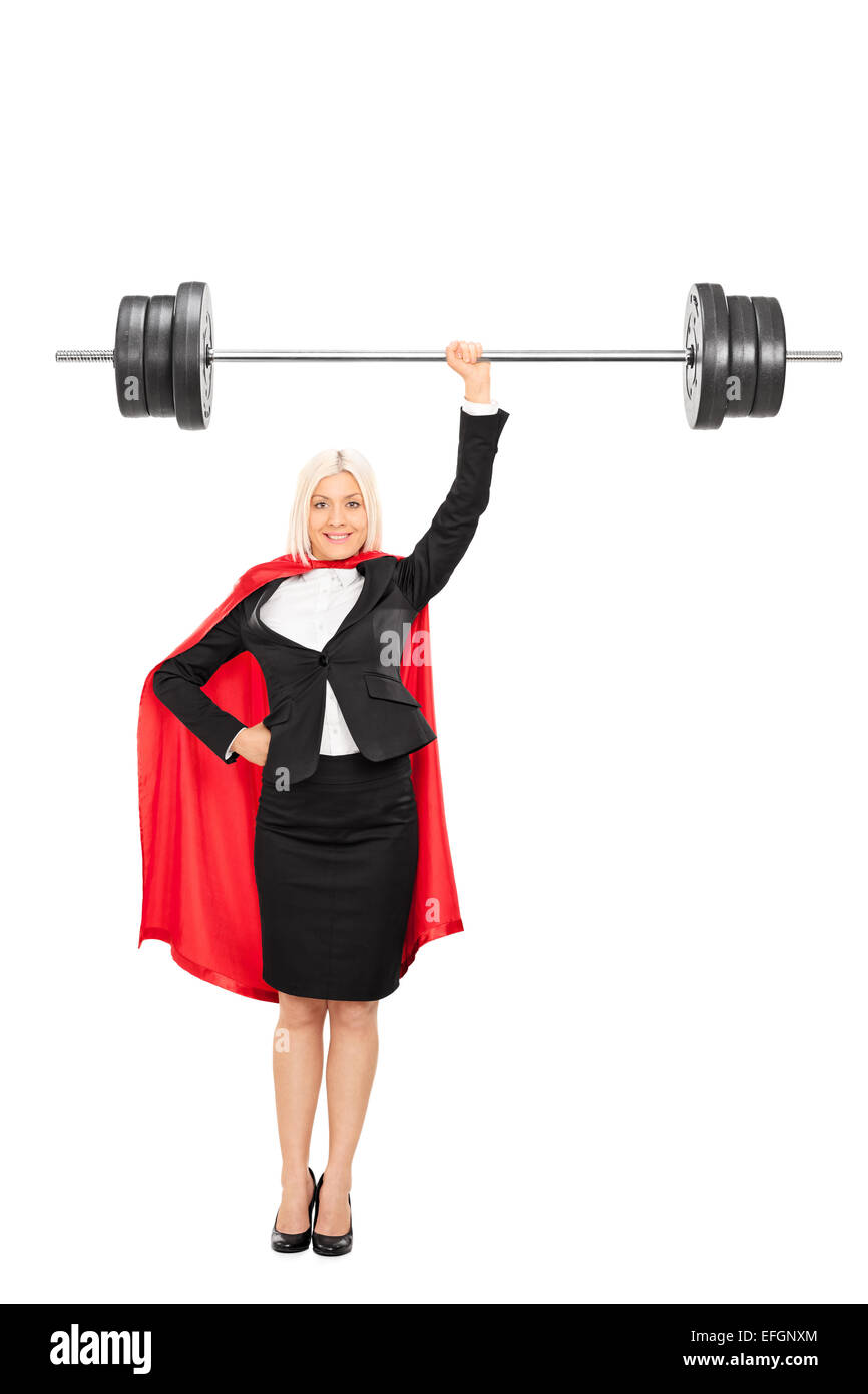 Full length portrait of a female superhero lifting a barbell isolated ...