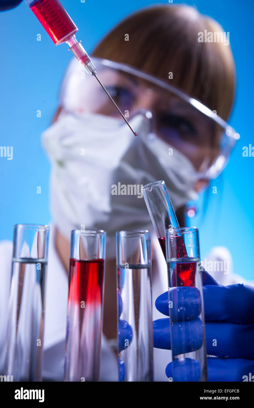 Laboratory, The Woman in the lab experimenting Stock Photo - Alamy