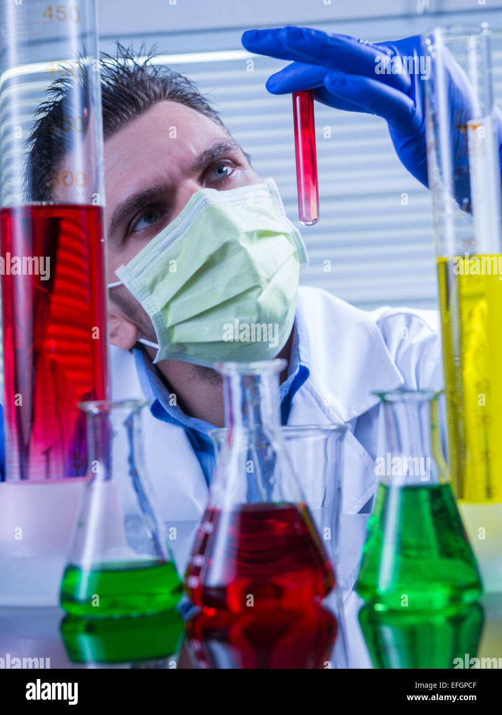 Laboratory equipment, Man in the lab experimenting Stock Photo - Alamy