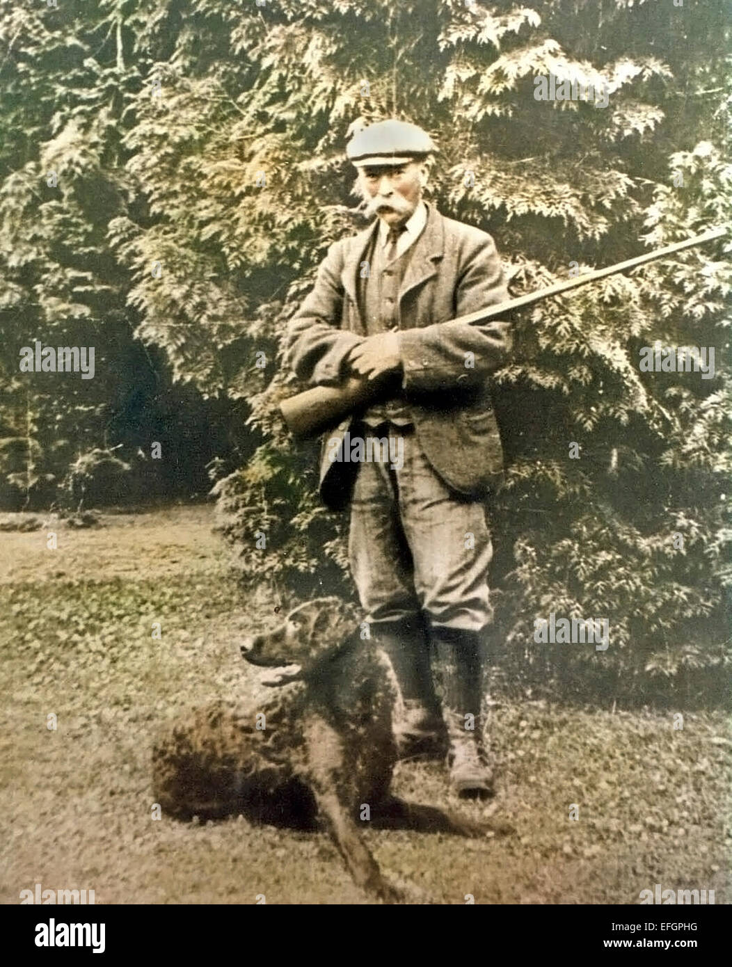 An early 20th century Scottish gamekeeper and his dog Stock Photo - Alamy