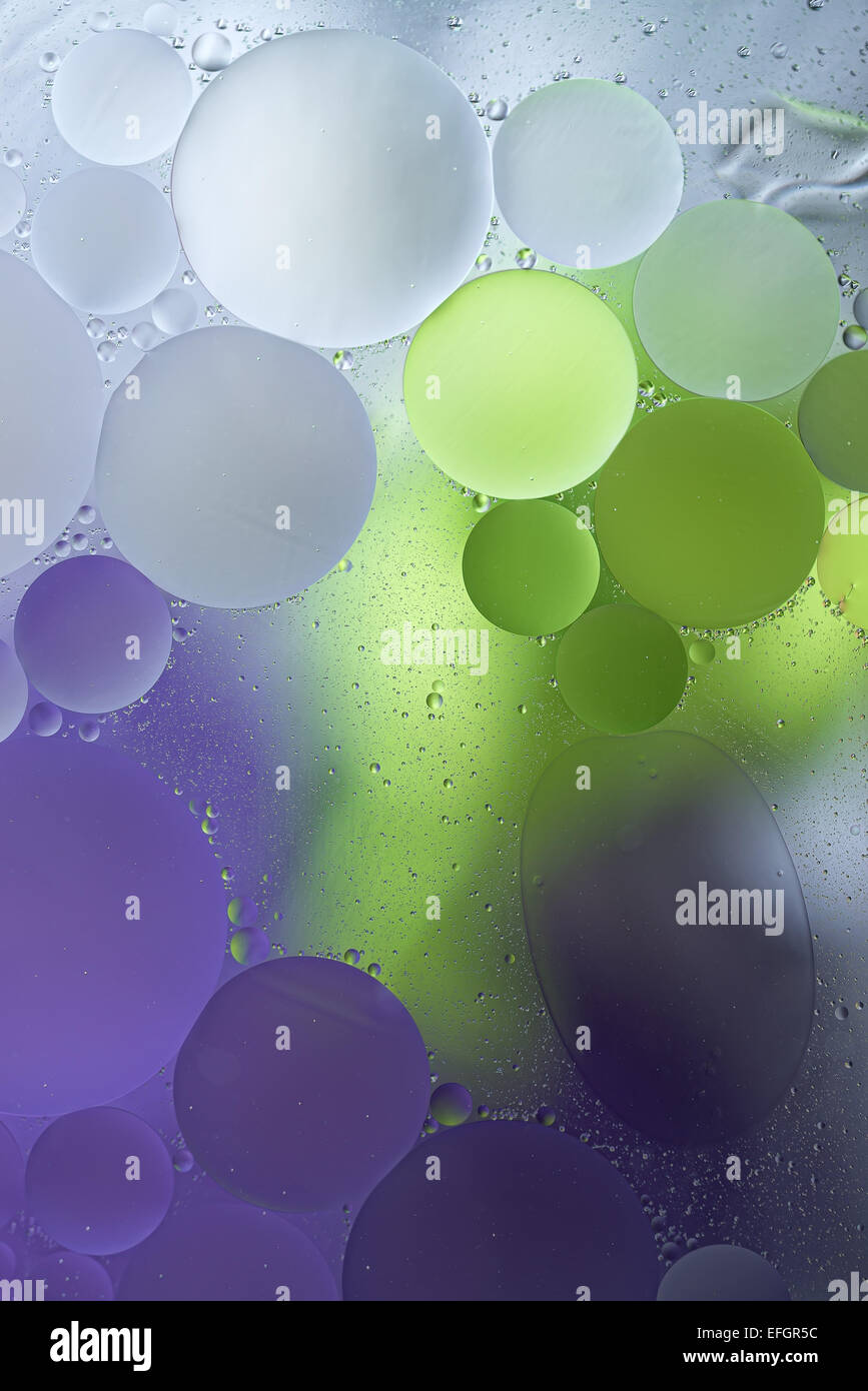 Purple, Green Gradient Oil drops in the water -abstract background ...