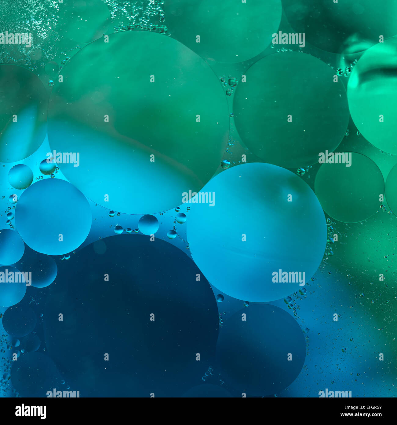 Green,blue Gradient Oil drops in the water -abstract background Stock ...