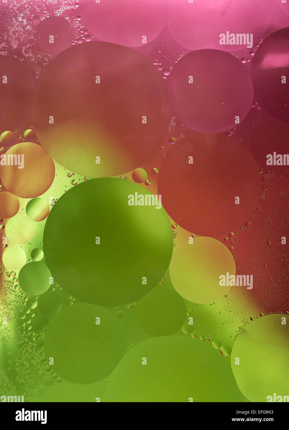 Green,pink Gradient Oil drops in the water -abstract background Stock ...