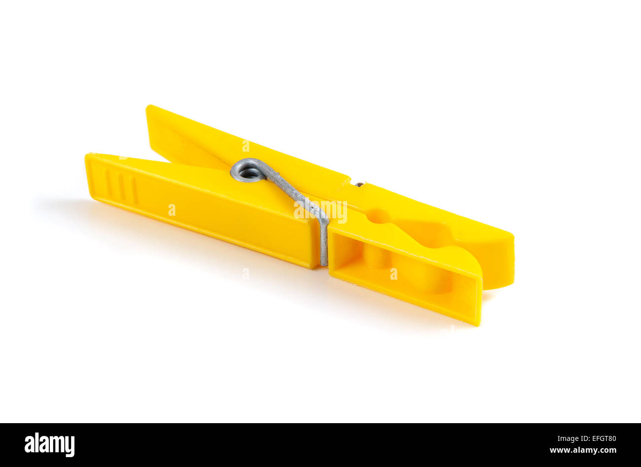 Yellow plastic clothespin isolated on white background with clipping ...