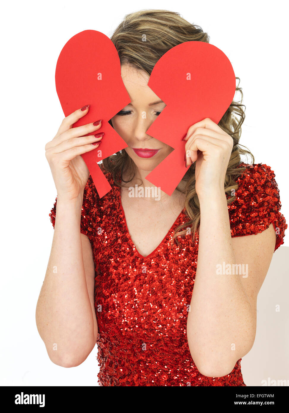 Lady holding a broken heart hi-res stock photography and images - Alamy