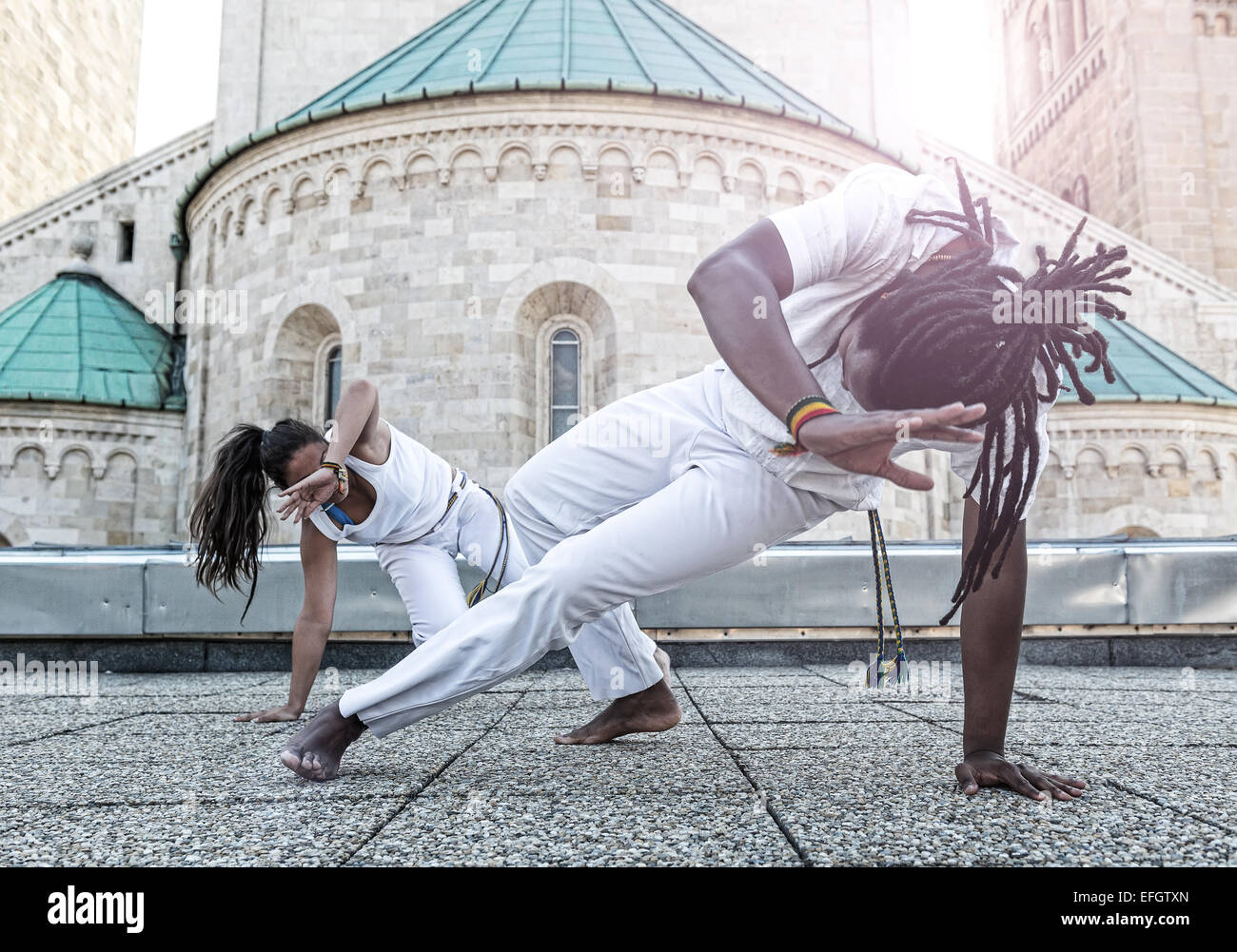 Capoeira brazilian man jumping white hi-res stock photography and ...