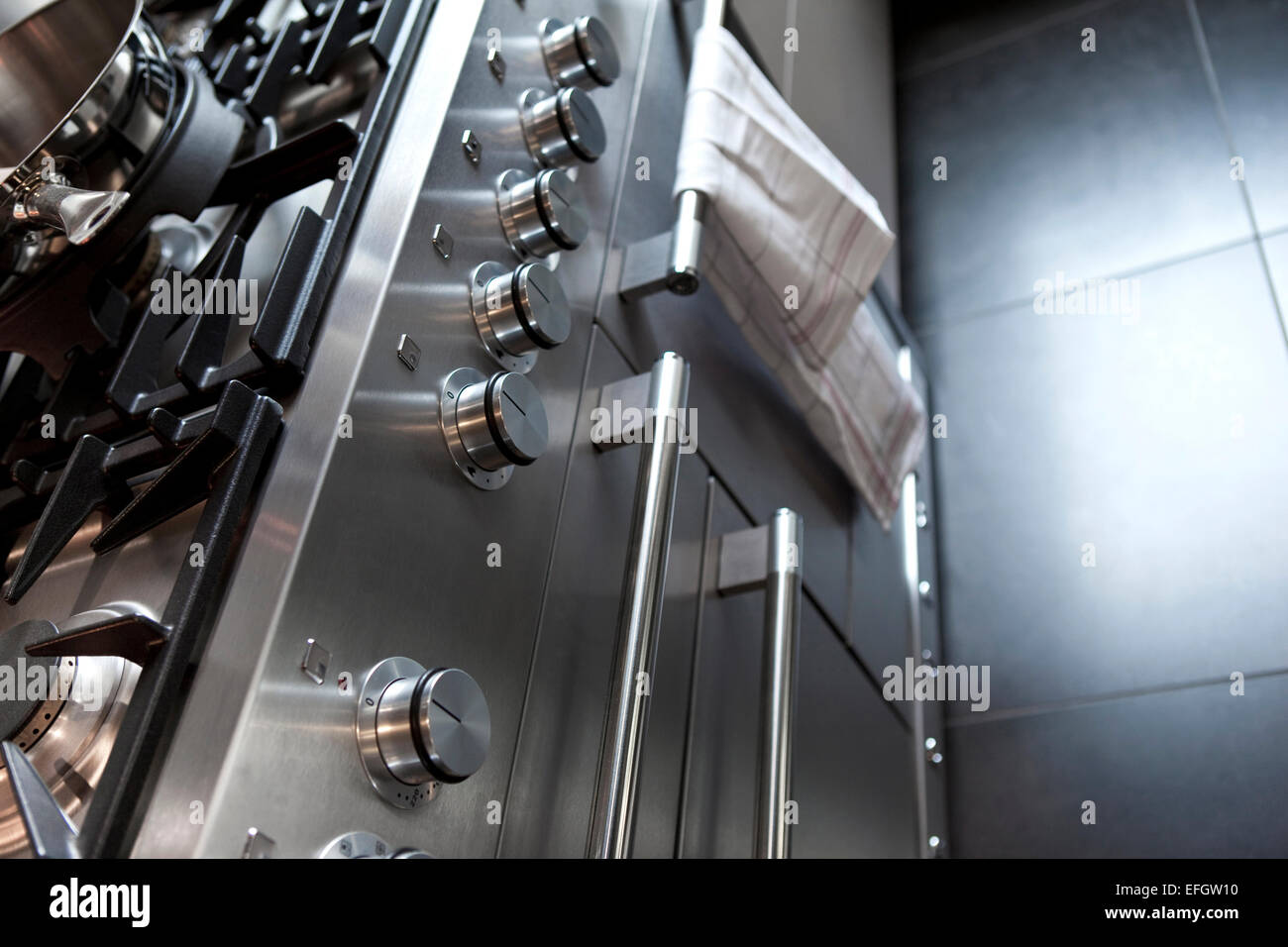 Design gas stove in a kitchen Stock Photo - Alamy