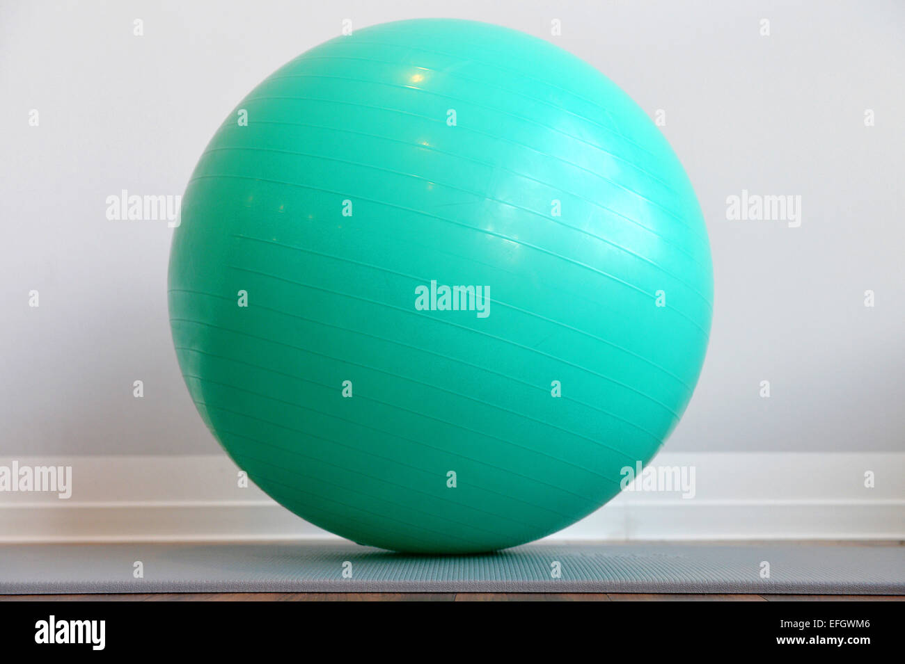 A gym ball on a mat Stock Photo - Alamy