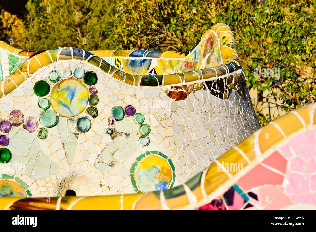 Colorful ceramic bench. Park Guell designed by Antoni Gaudi. Barcelona ...