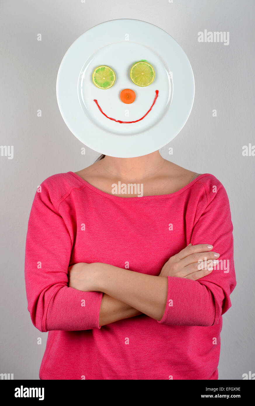 Woman smiley face plate hi-res stock photography and images - Alamy