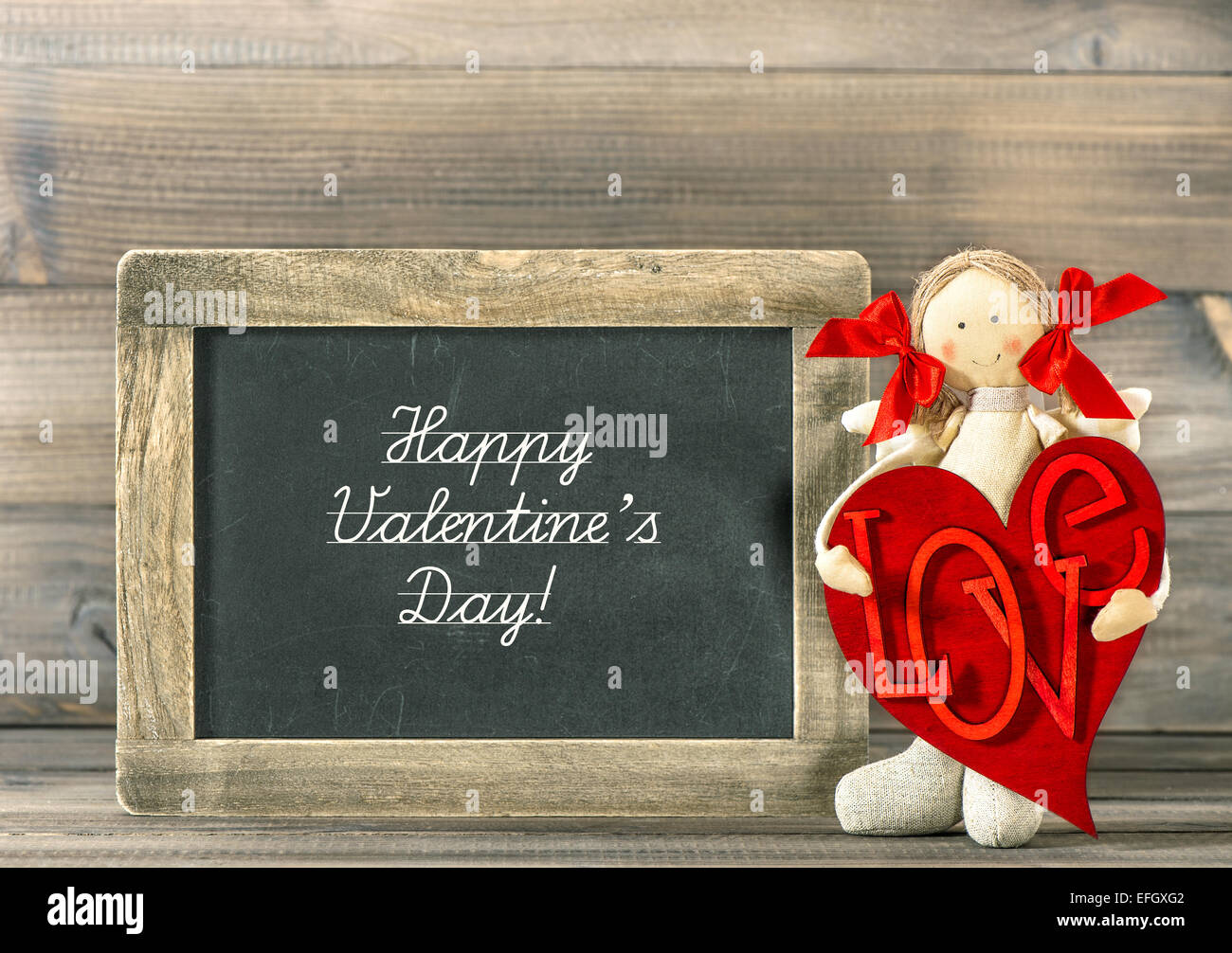 Valentines Day decoration. Funny girl with Red Heart and blackboard ...