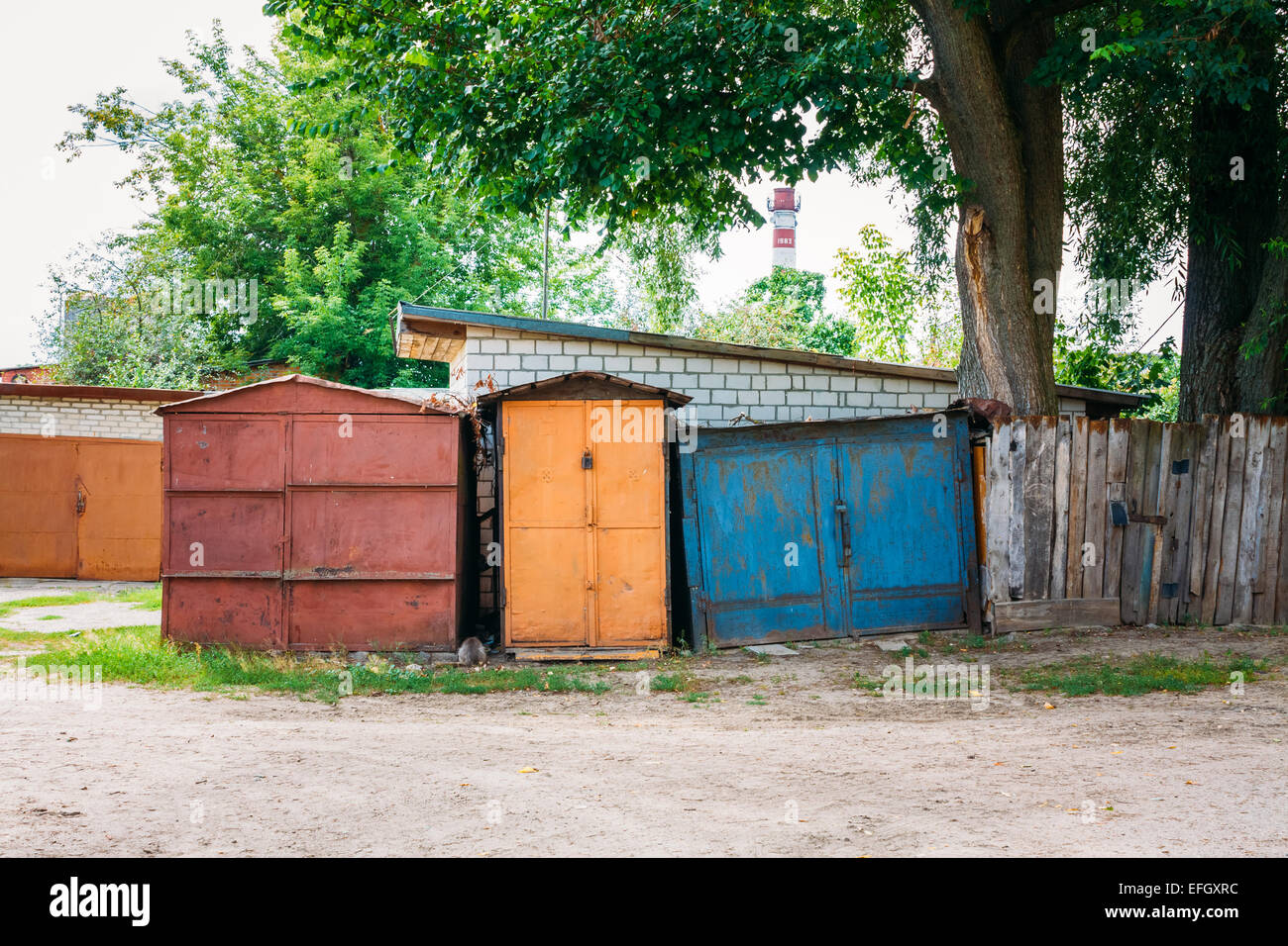 Typical old Soviet rusty iron garages for storage of tools, vehicles ...