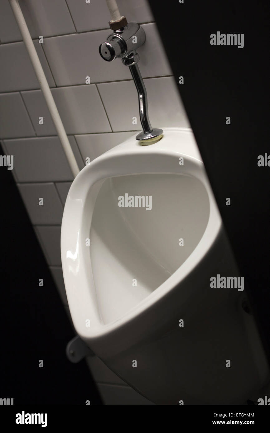 Basin and faucet in a urinal Stock Photo - Alamy
