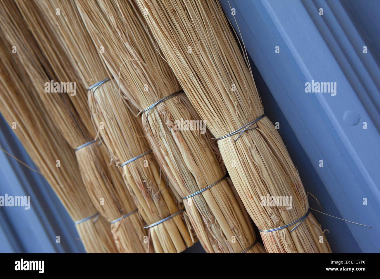 Decorative straw brooms hi-res stock photography and images - Alamy