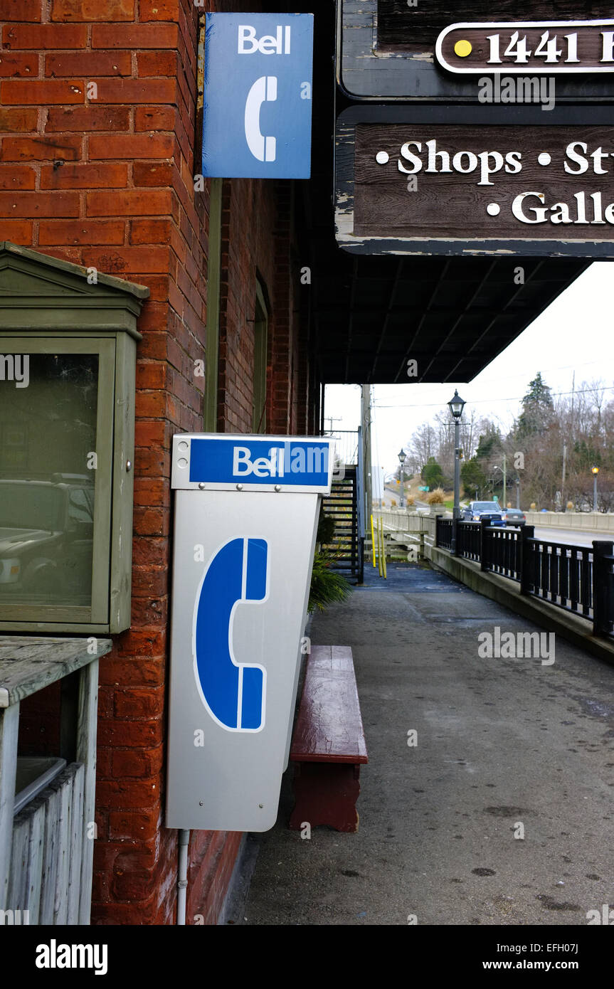 A Bell public telephone on a wall in a Canadian town Stock Photo - Alamy