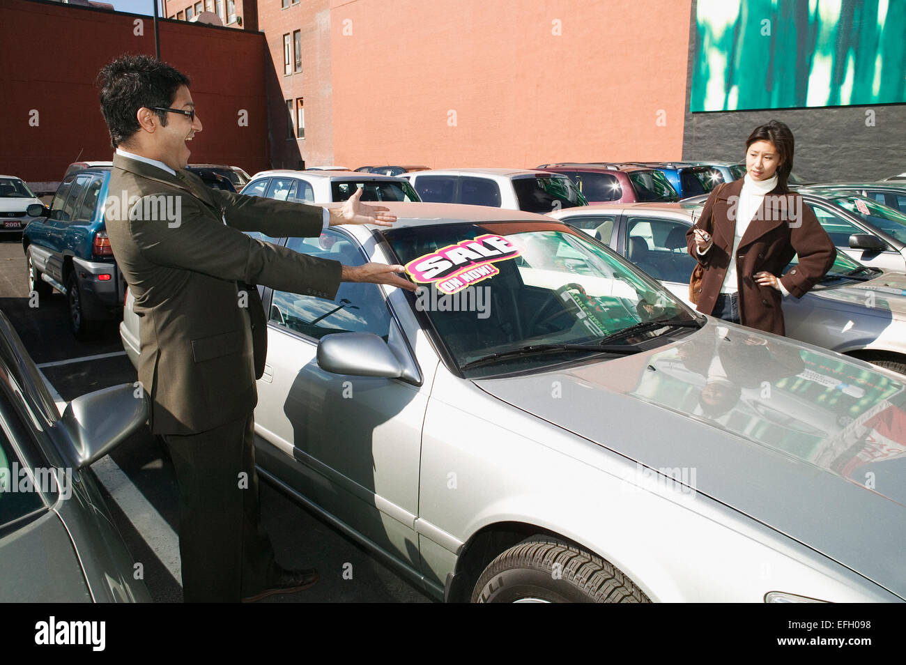 Car salesman working hard Stock Photo - Alamy