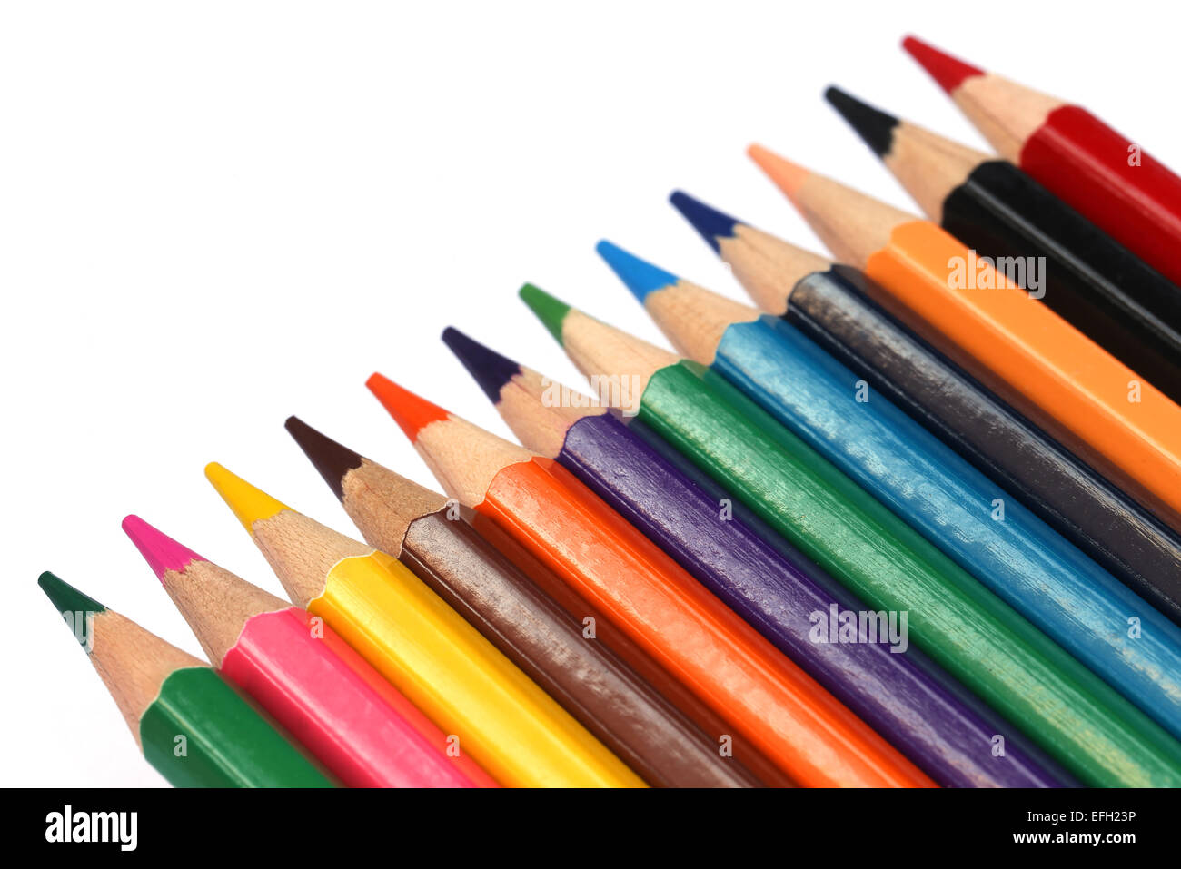 Color pencils over white background Stock Photo - Alamy