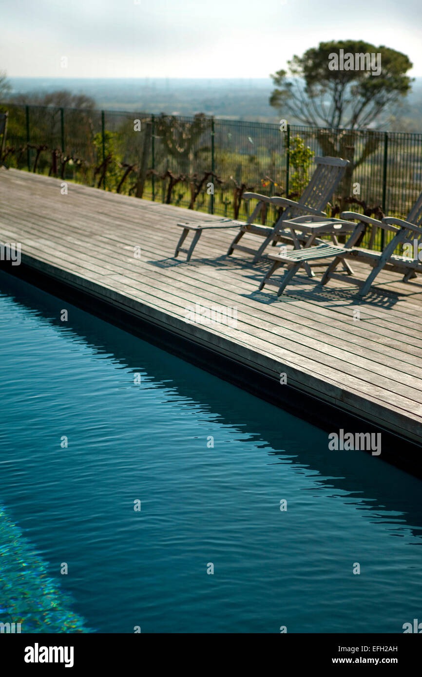 Swimming pool on a wooden terrace Stock Photo - Alamy