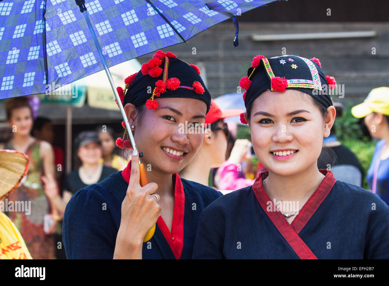 Two beautiful Lao girls joining traditional Lao New Year street parade ...