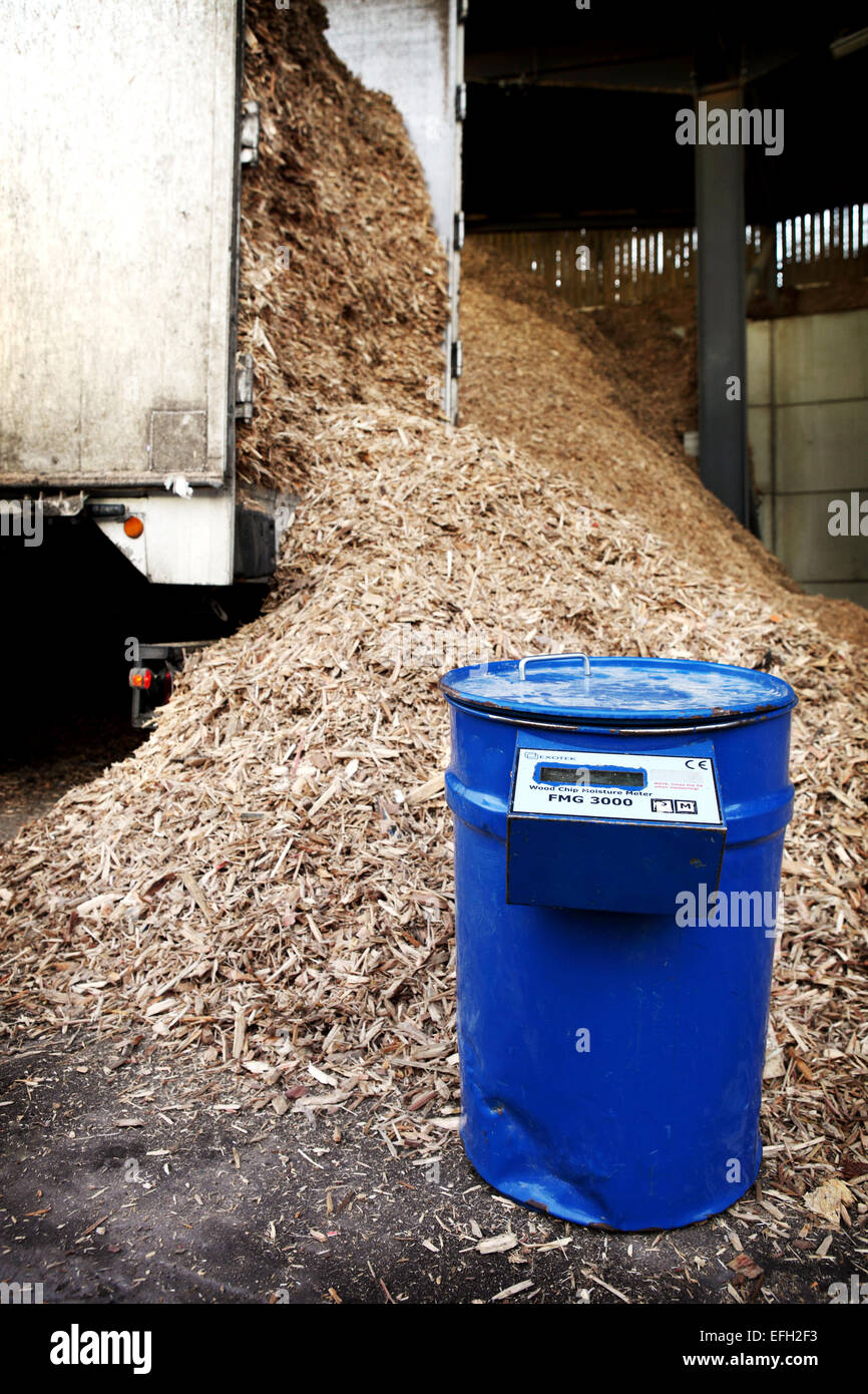 Wood chip moisture meter amongst unloading forestry waste at biomass ...
