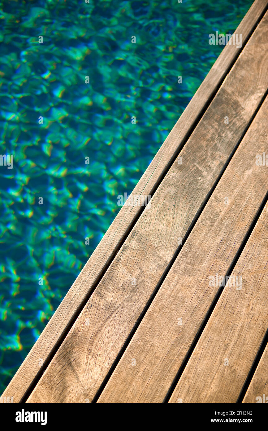 Wooden deck of a swimming pool Stock Photo - Alamy