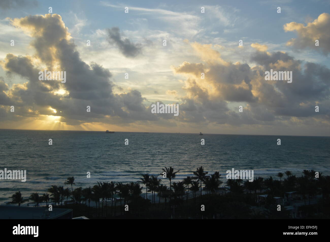 Sunset view on the beach Stock Photo - Alamy