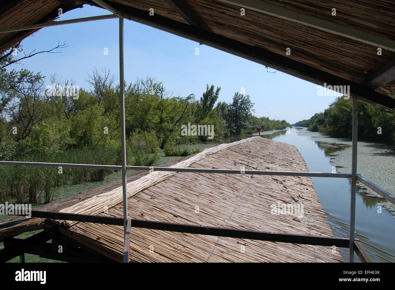 Tourist boat sailing the old riverbed of the Bega. Old Bega is a ...