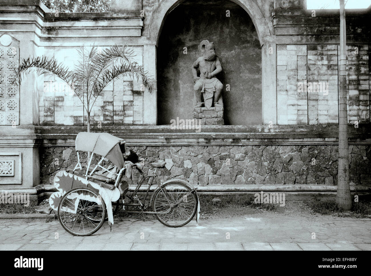 Street scene and a statue of Hanuman in Solo Surakarta in Java in ...