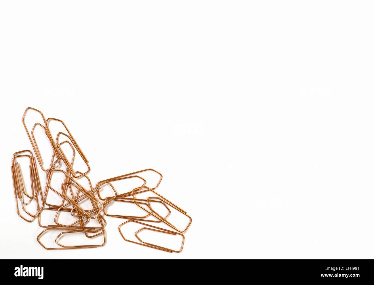 Paper clips on white Stock Photo - Alamy