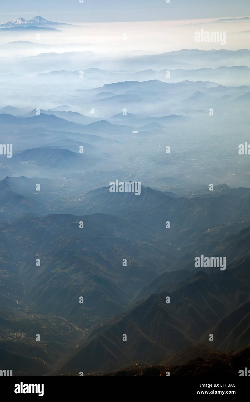 Mexico City, Mexico - Mist on the mountains surrounding Mexico City ...