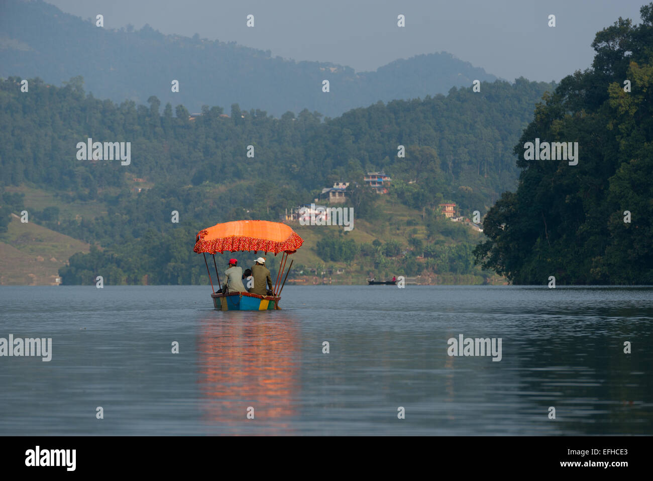 Tourist boat on Begnas Lake, near Pokhara, Nepal Stock Photo - Alamy