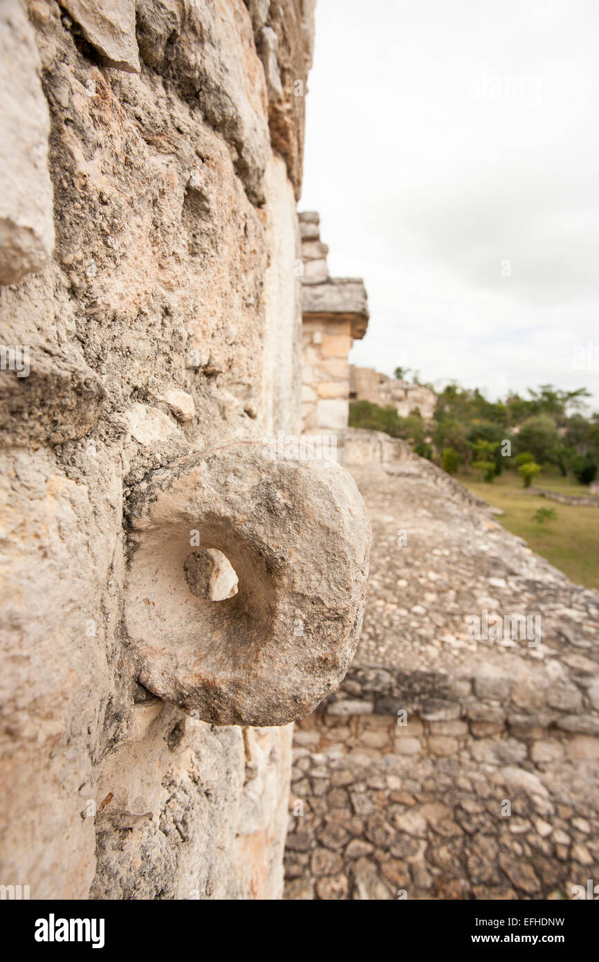 Detail of a fastening stone in a wall at Ek' Balam. A stone embedded in ...