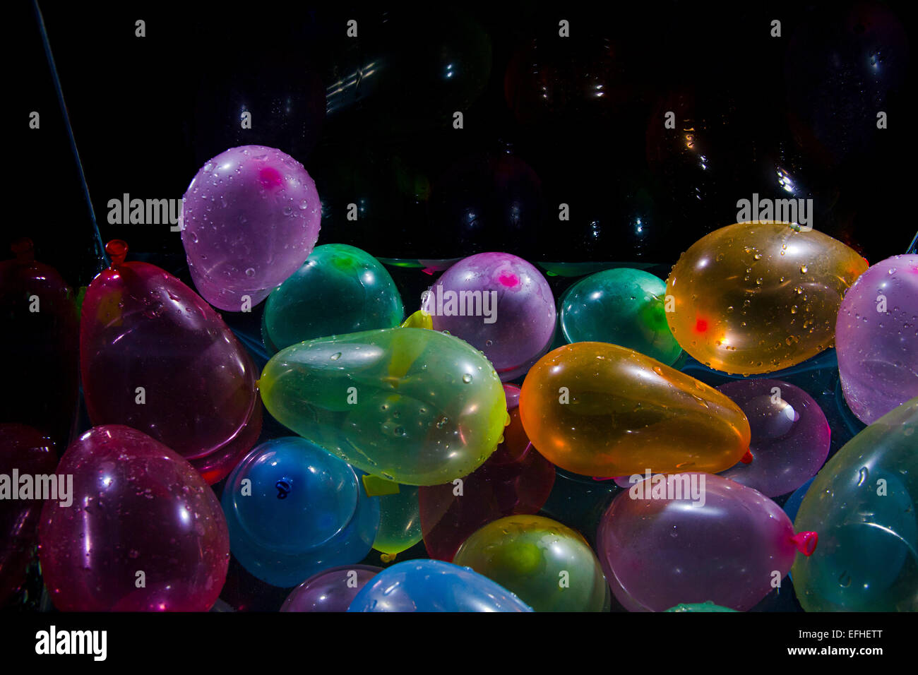 Holi water balloon hi-res stock photography and images - Alamy