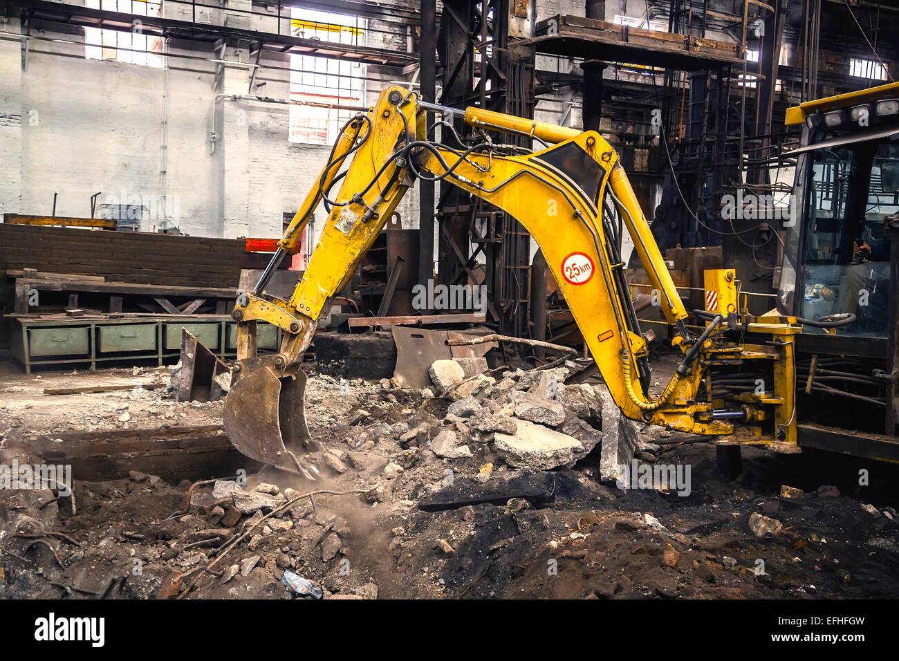 Industrial interior with bulldozer inside Stock Photo - Alamy