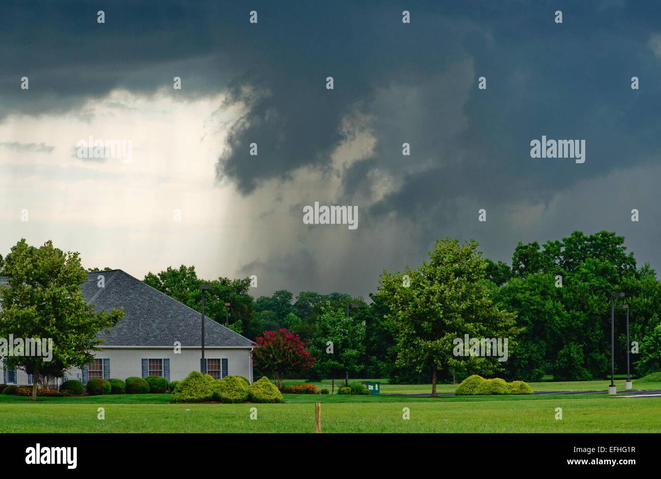 House in a summer storm Stock Photo - Alamy
