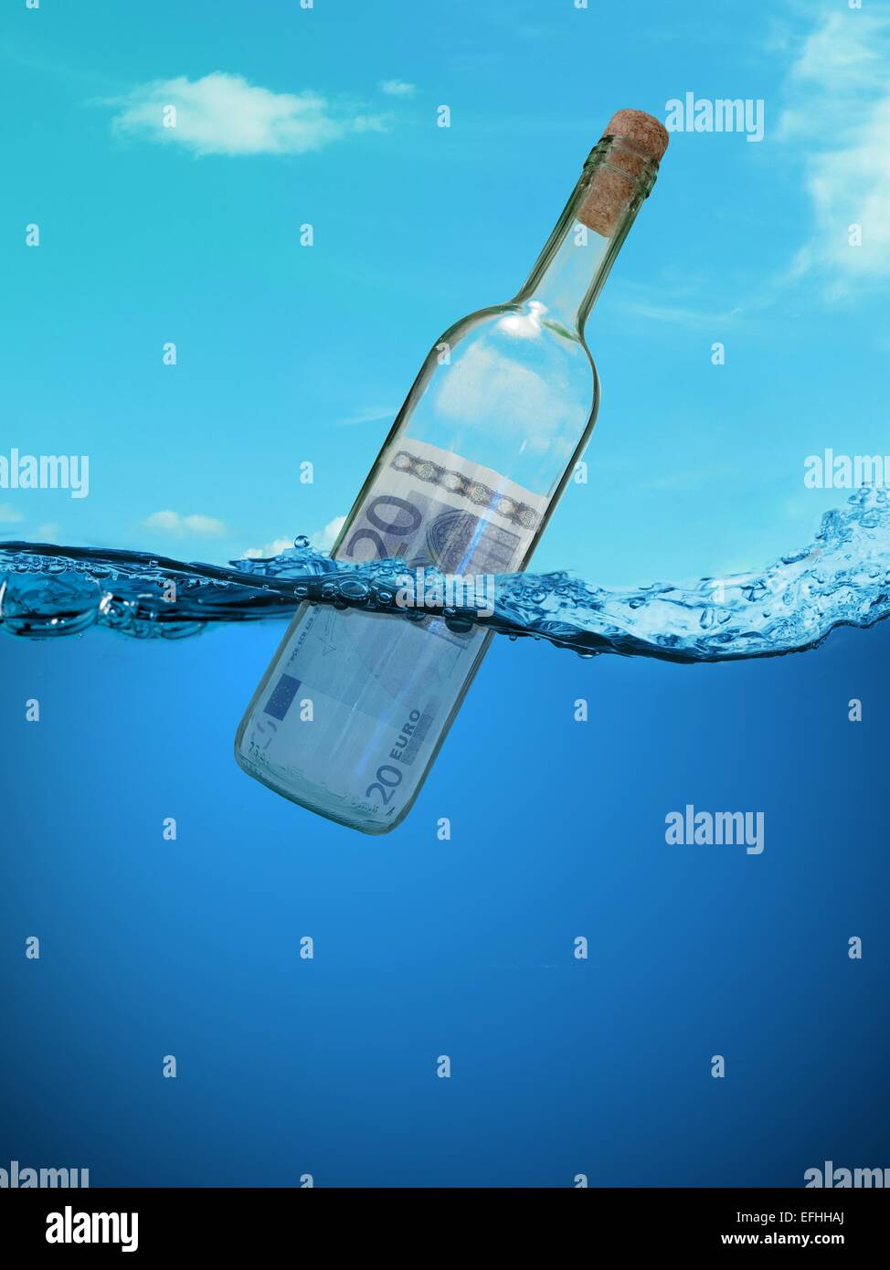 Concept "financial assistance". Bottle of money floating in the water ...