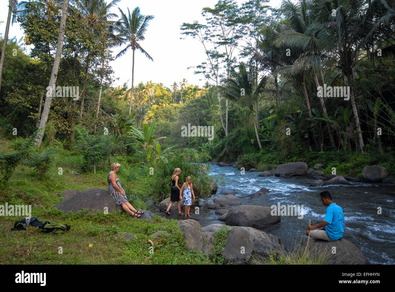 trekking along a river at bali indonesia Stock Photo - Alamy