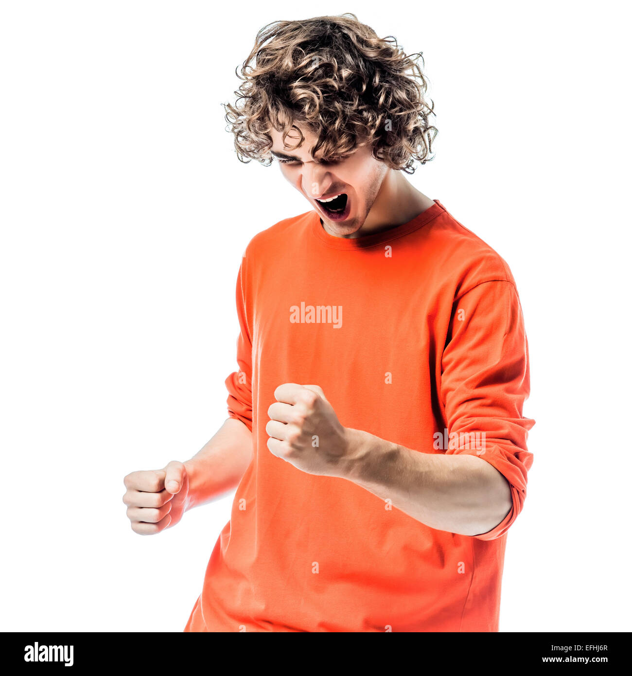 one young man strong screaming happy portrait in studio white ...
