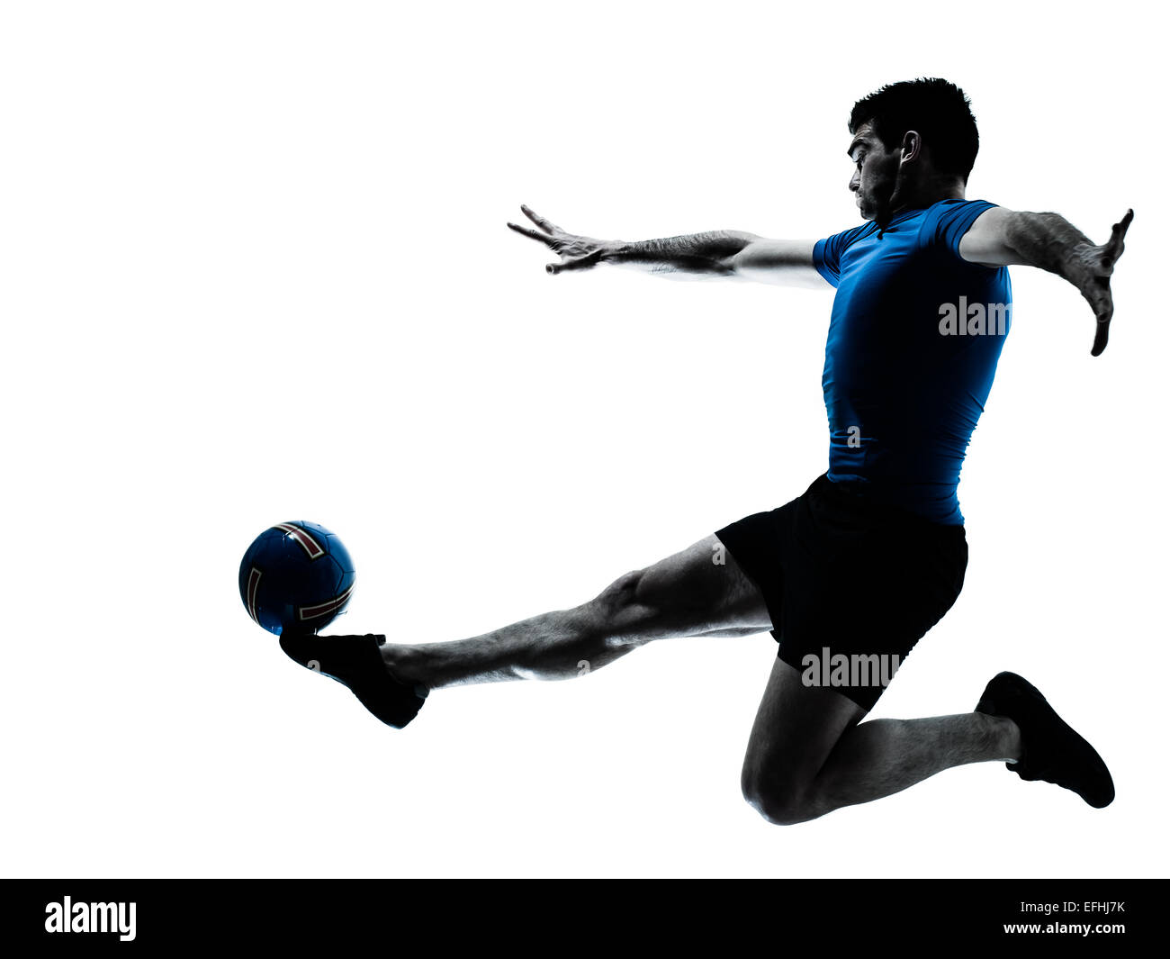 one caucasian man flying kicking playing soccer football player ...